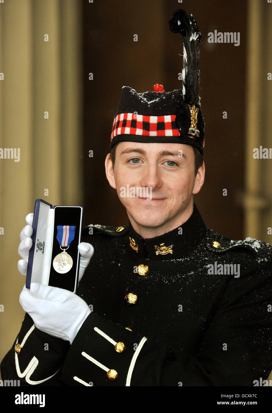 Investiture at Buckingham Palace Stock Photo - Alamy
