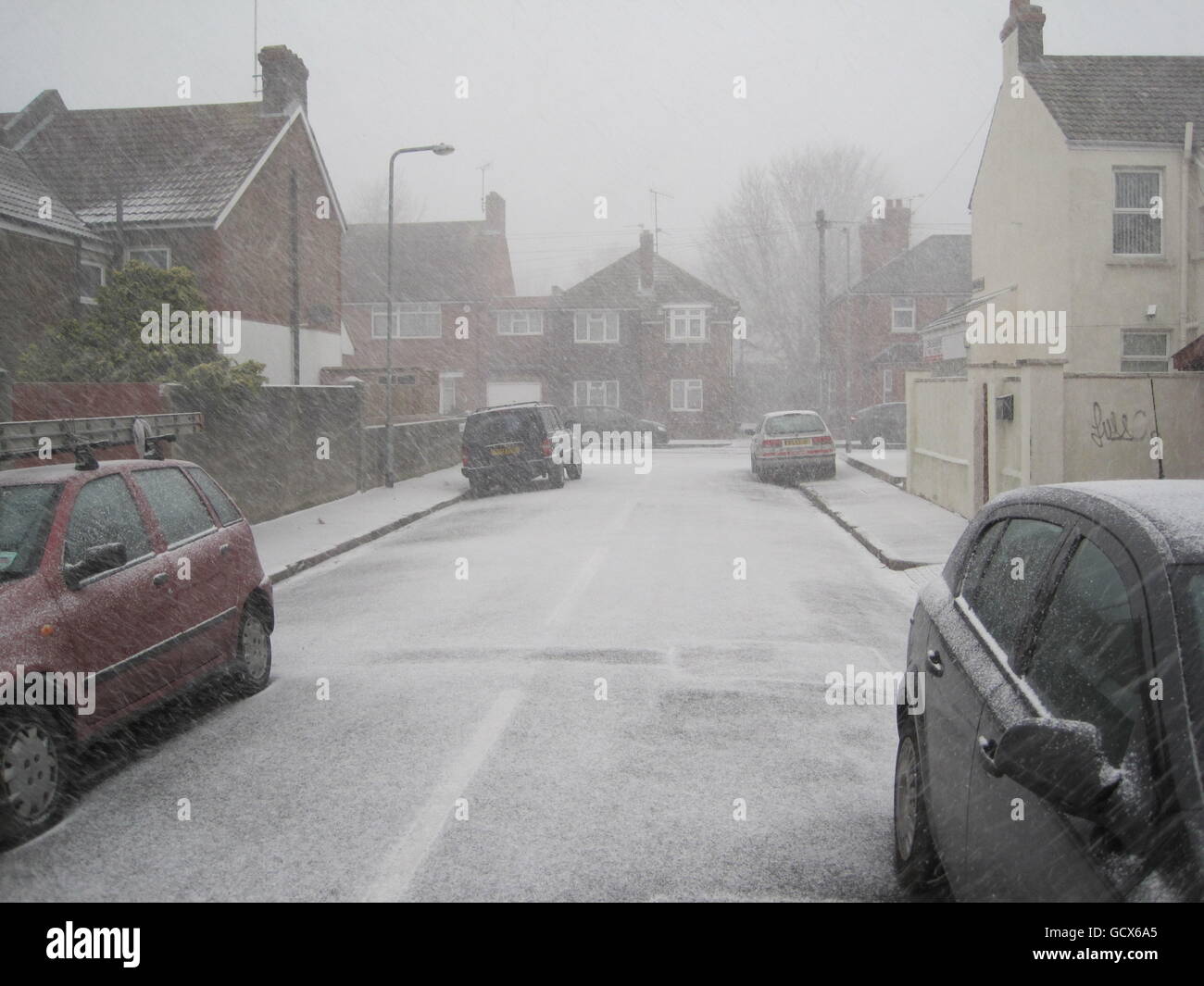 A light dusting of snow settles on a street in Eastbourne, East Sussex ...