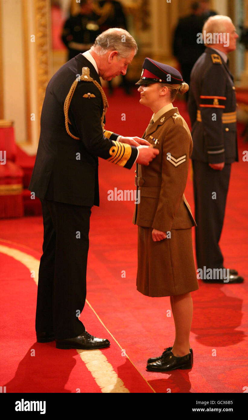 Corporal Julie May, Royal Army Medical Corps, is awarded the Queen's ...