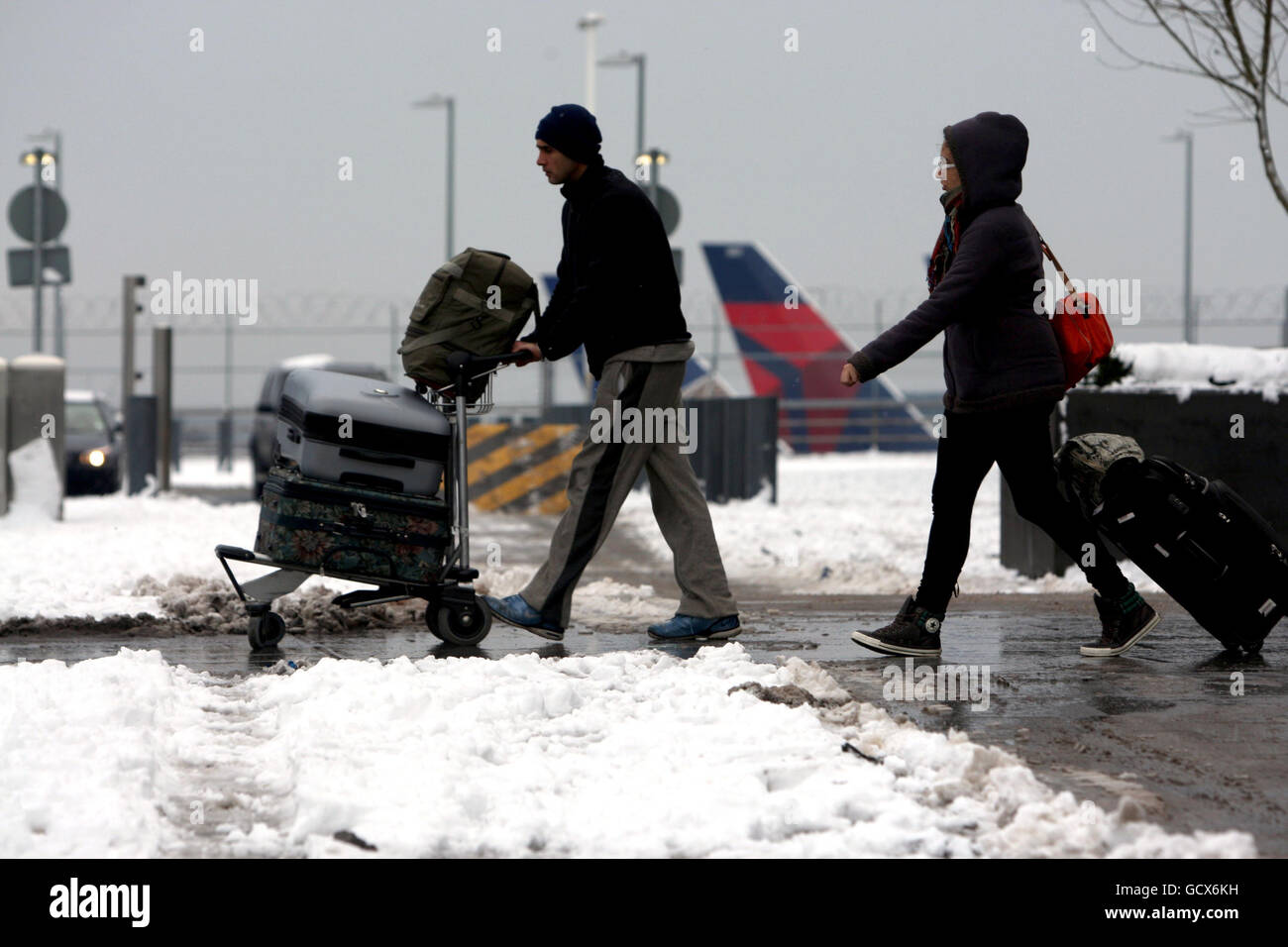 Passengers leave after waiting in Terminal 4 at Heathrow Airport ...