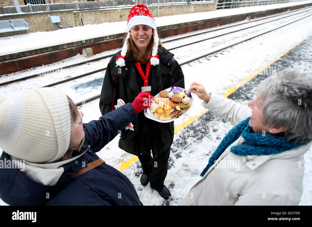 Booking Clerk holds party Stock Photo - Alamy