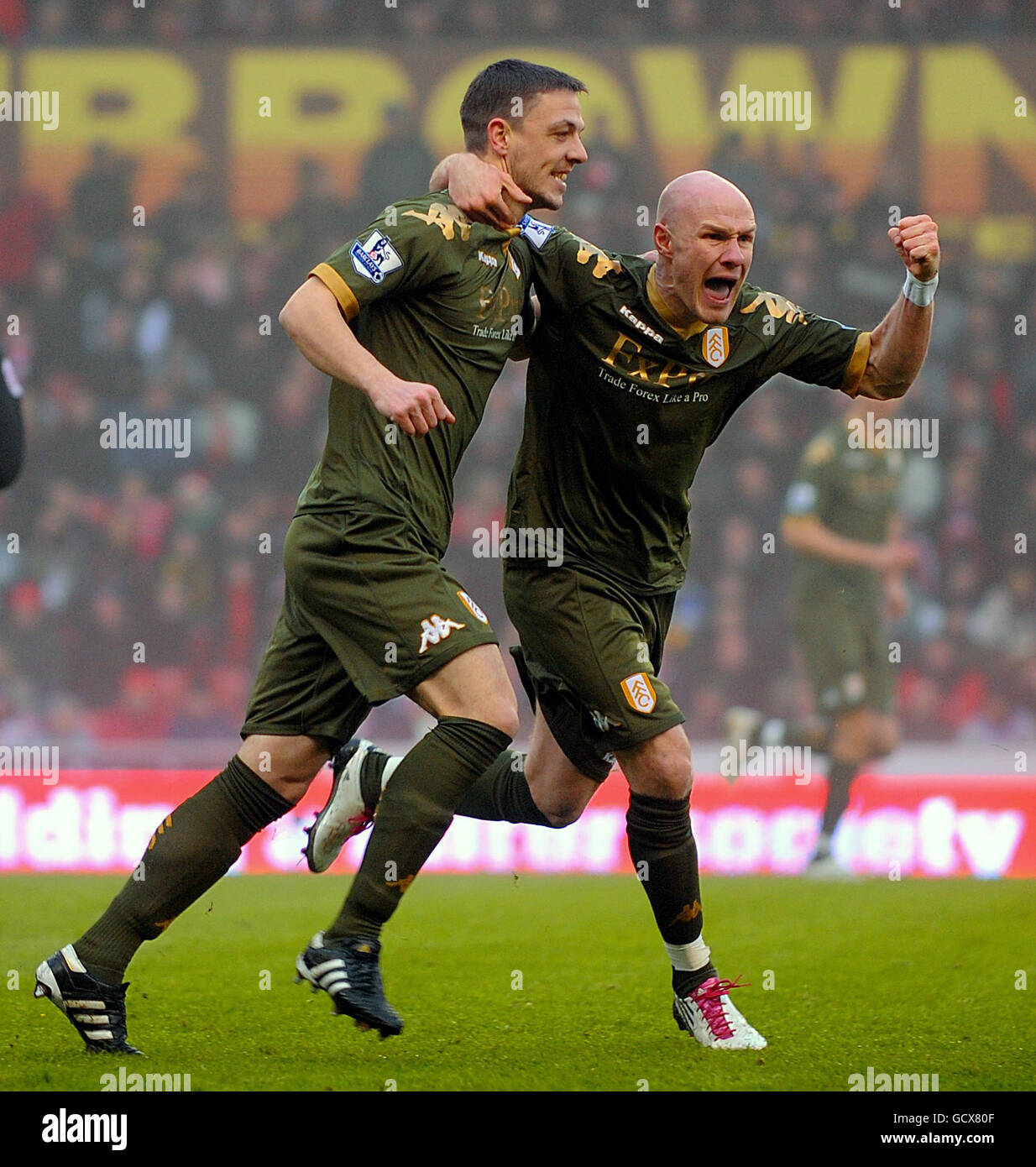Fulham's Chris Baird (left) celebrates scoring his second goal Stock ...