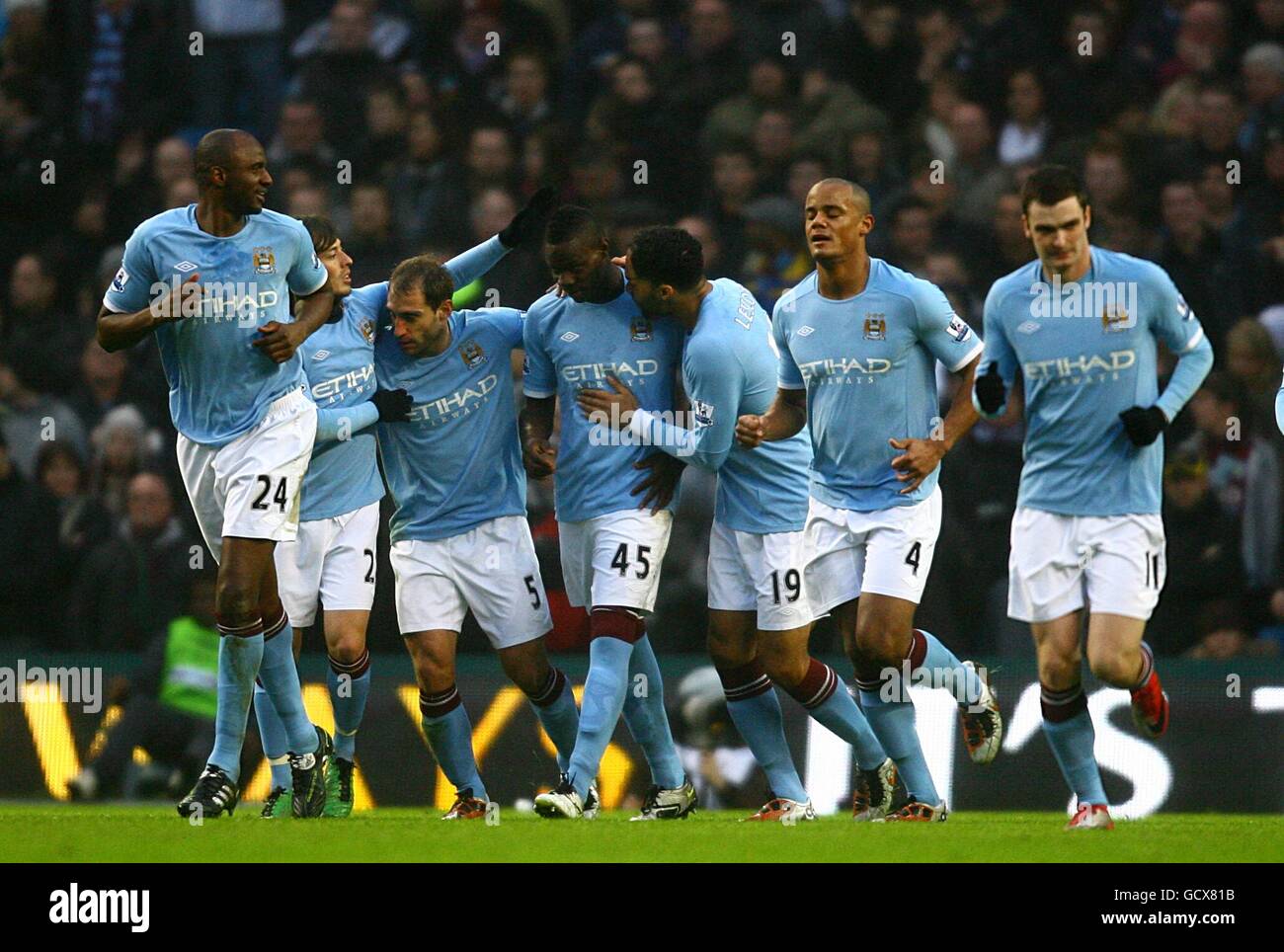 Manchester City's Mario Balotelli (45) celebrates scoring his sides ...