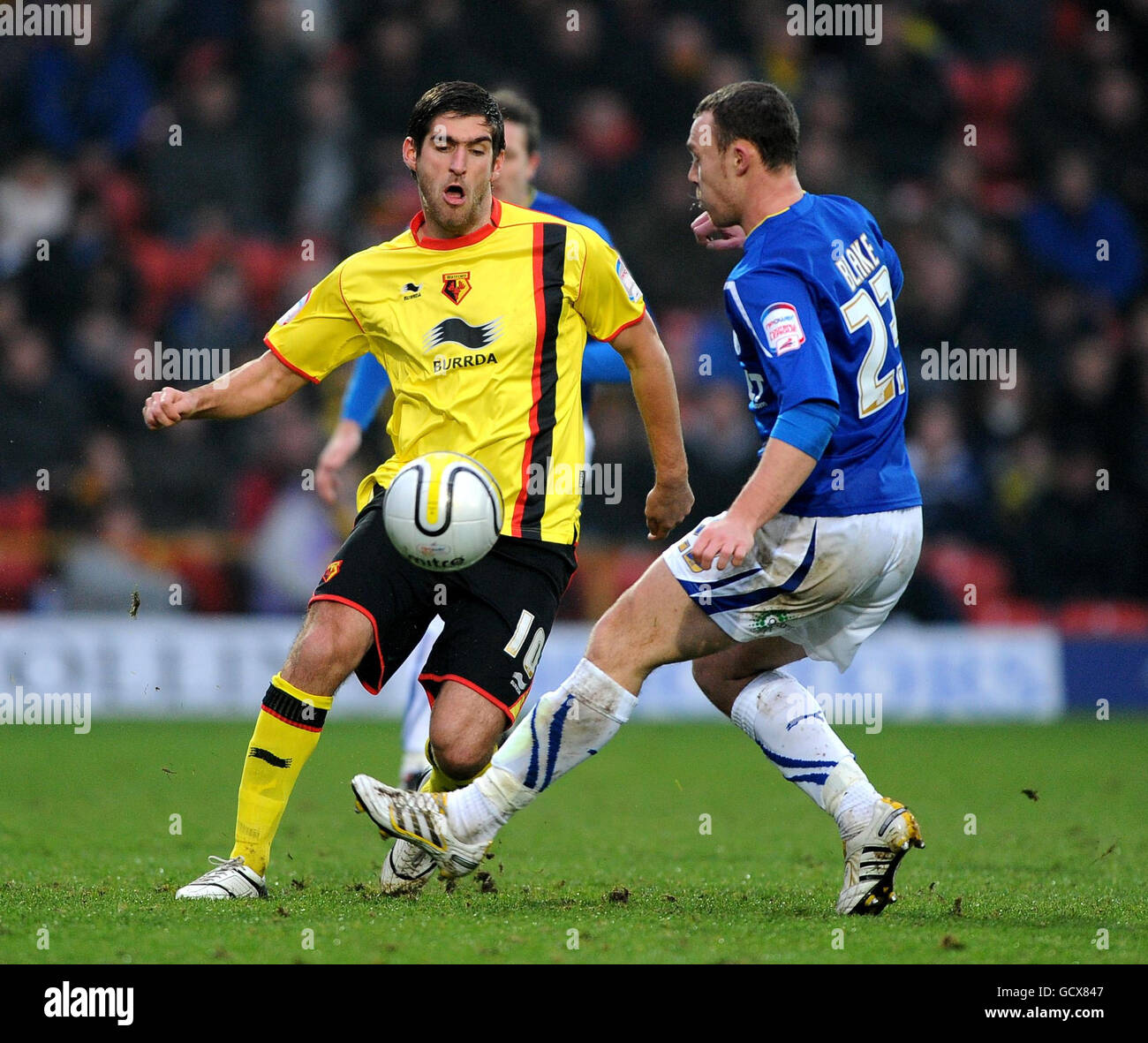 Watford's Danny Graham and Cardiff City's Darcy Blake (right) battle ...