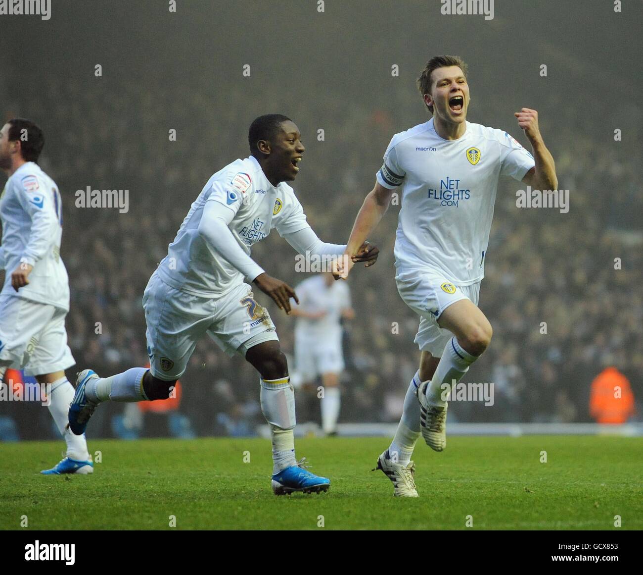Leeds's Jonathan Howson (right) celebrates with team-mate Max Gradel ...
