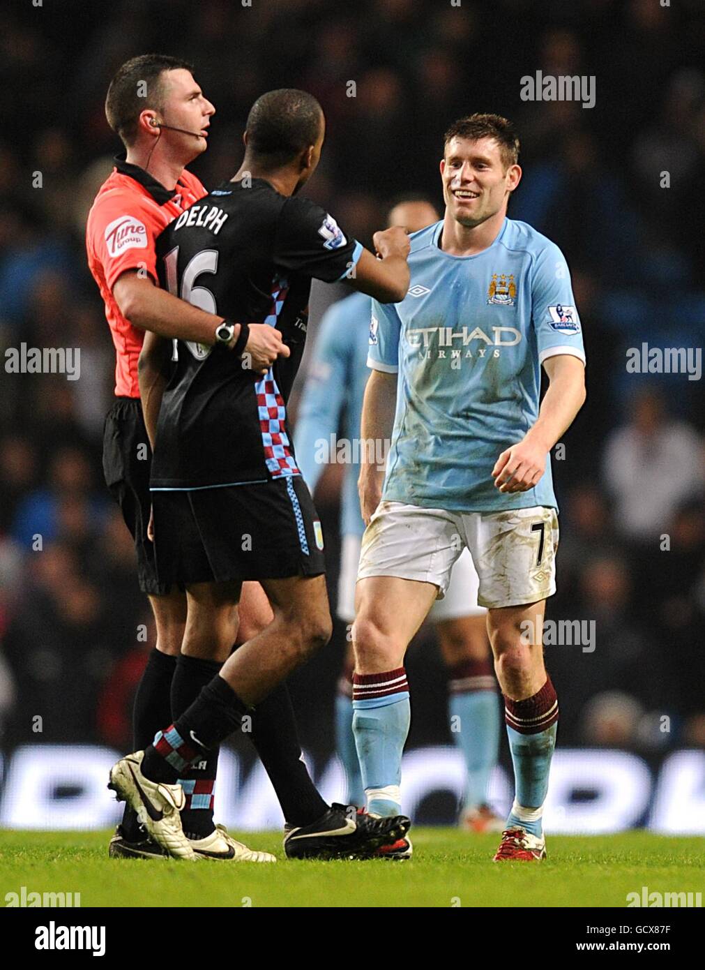 Aston Villa's Fabian Delph (left) and Manchester City's James Milner ...