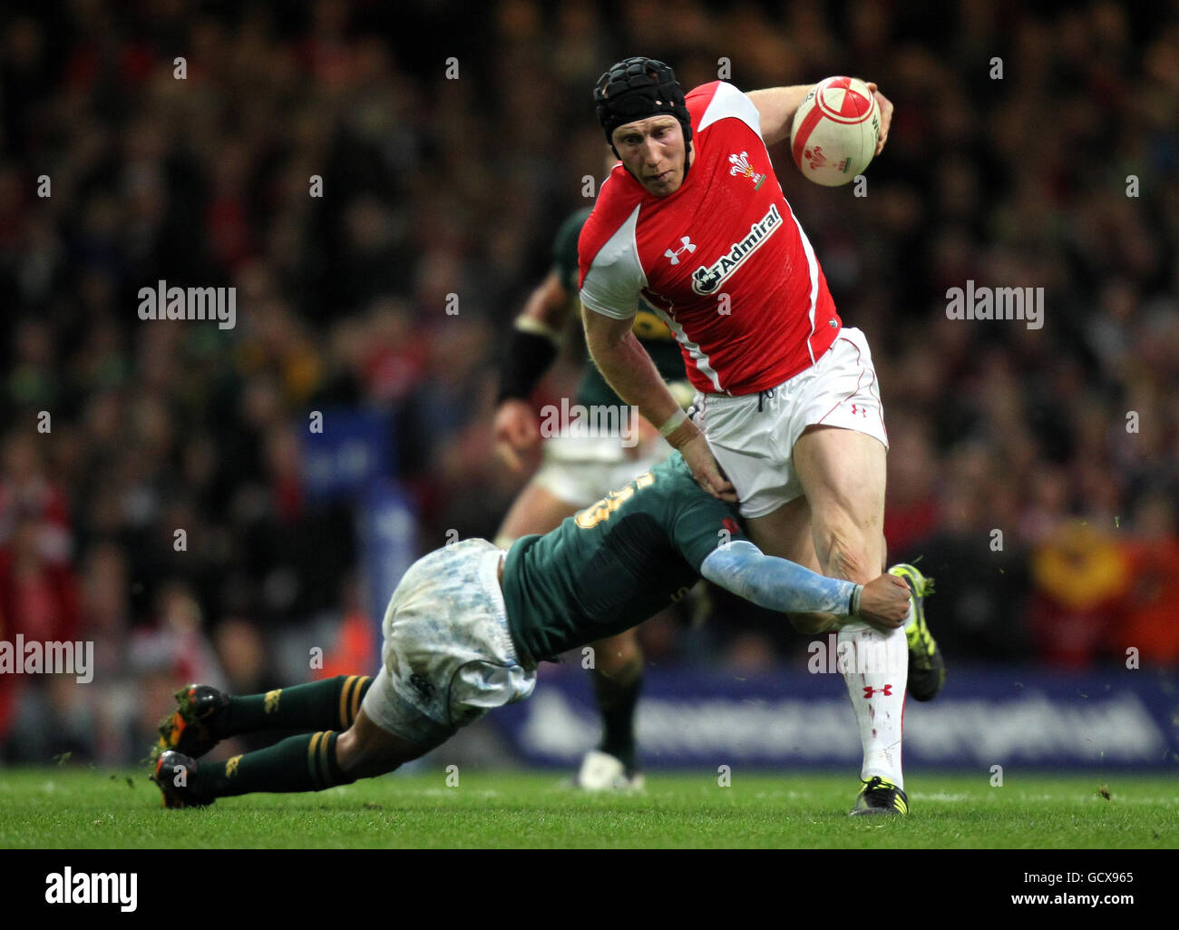 Wales Tom Shanklin is tackled by South Africa's Gio Aplon during the ...