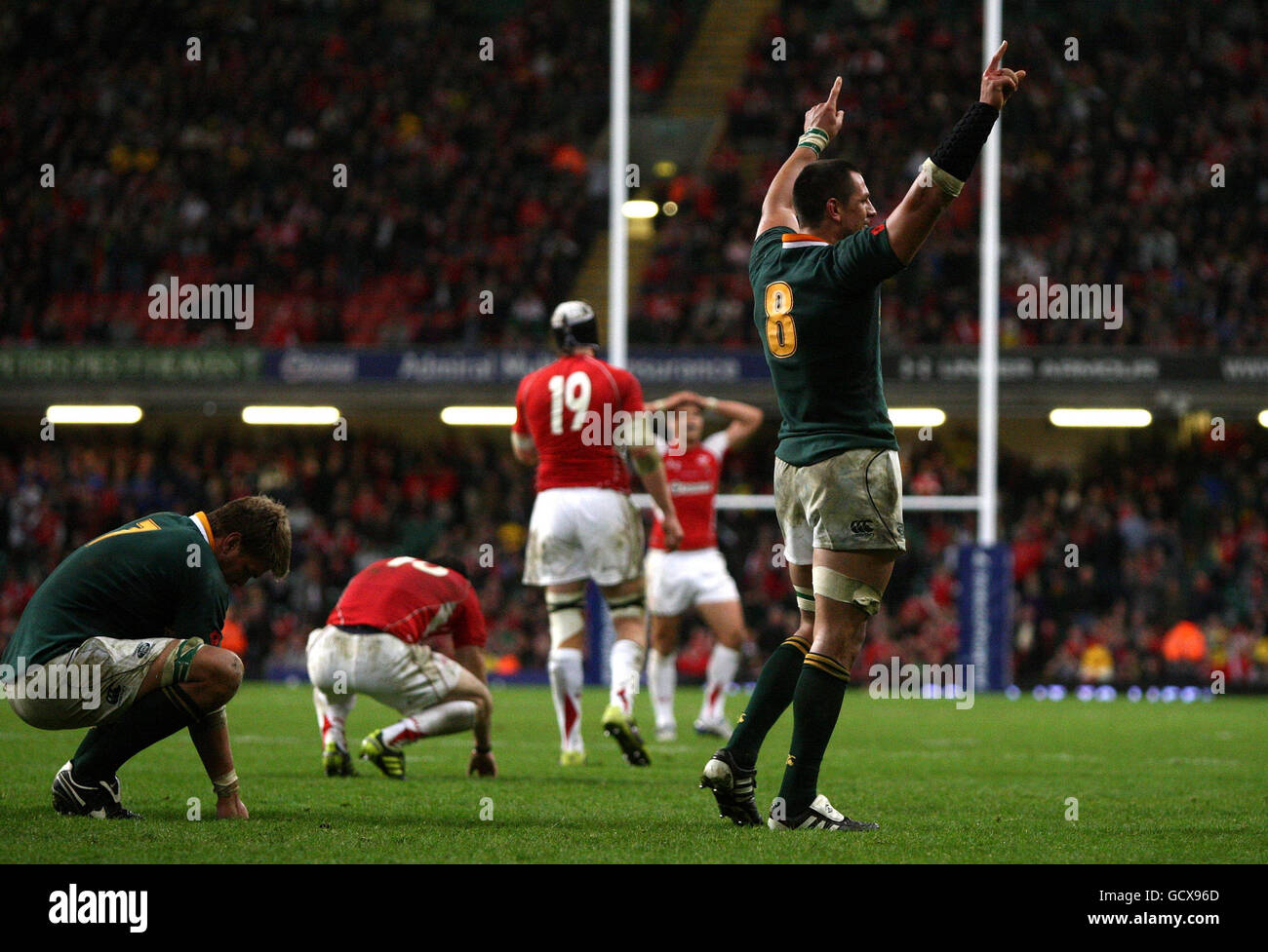 Pierre Spies celebrates South Africa's victory over Wales during the ...