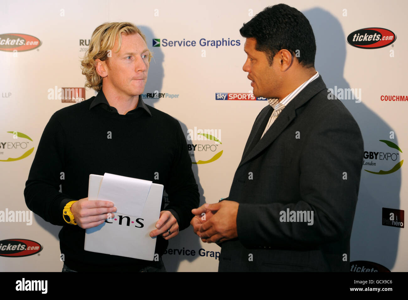 Samoa's Team manager Mathew Vaea (right) is interviewed on camera by ...