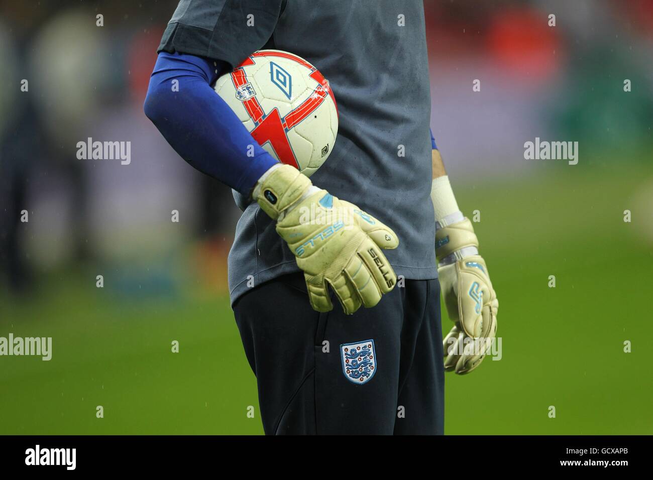 England goalkeeper Robert Green holds a national team match-ball during ...