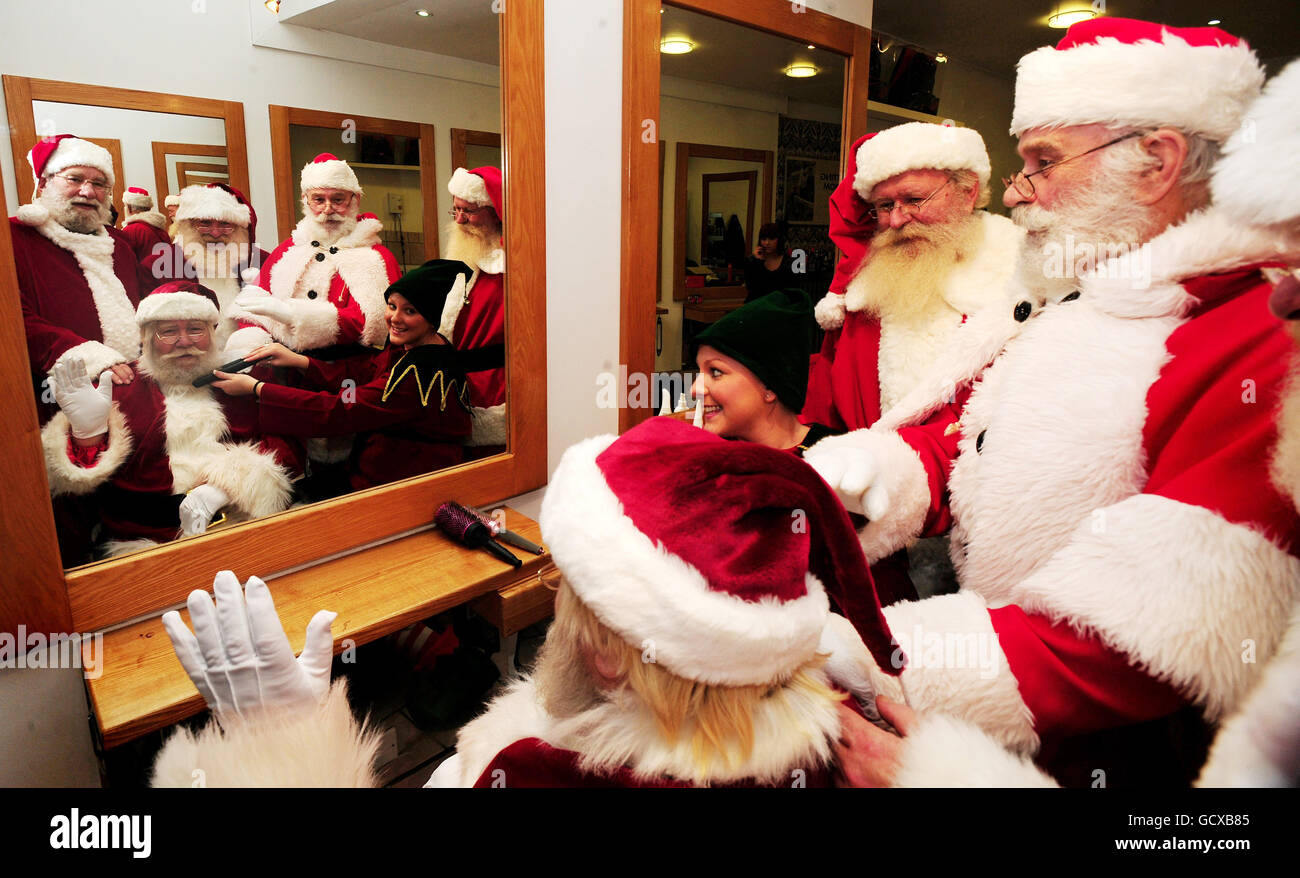 Santa George (George Pickford) has his beard attended by elf Kelly ...