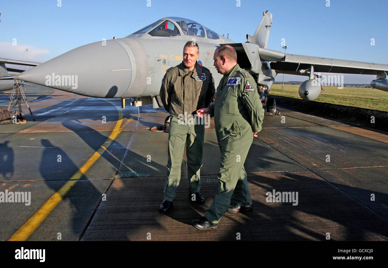 RAF Lossiemouth Station Commander Group Captain Andy Hine (left) and ...