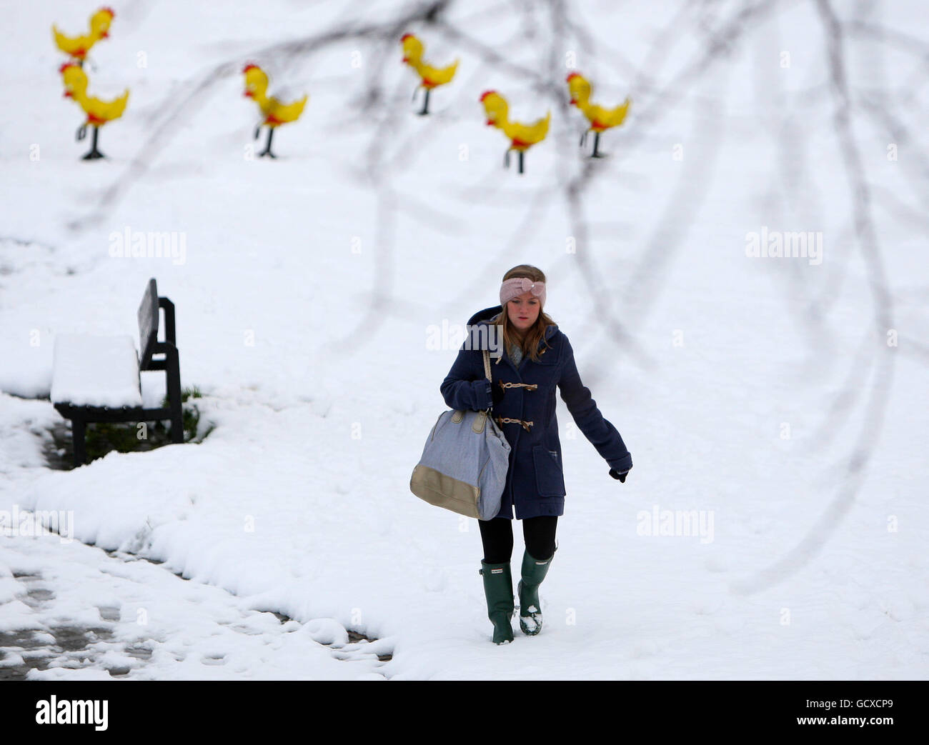 A woman walks through a snow covered Victoria Park in Aberdeen ...