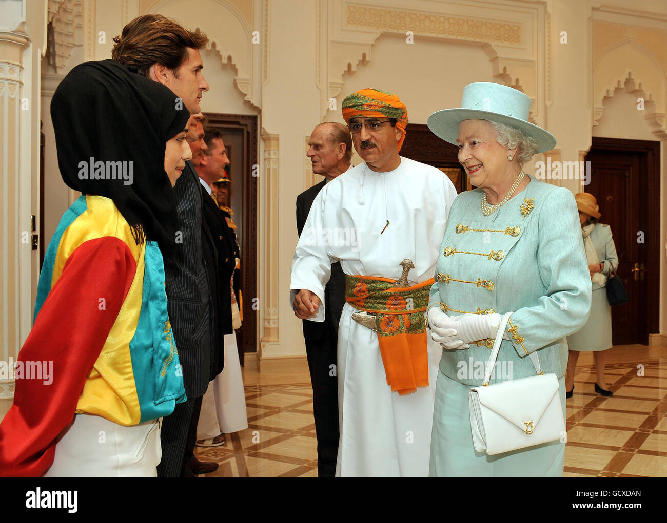 Queen elizabeth ii meets a female horse racing jockey hi-res stock ...