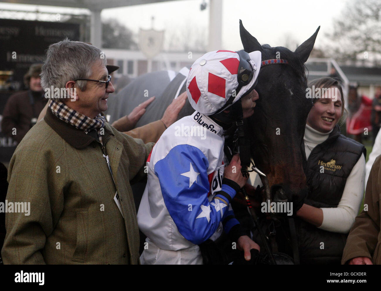 Jockey Daryl Jacob is congratulated after winning the Hennessy Gold Cup ...