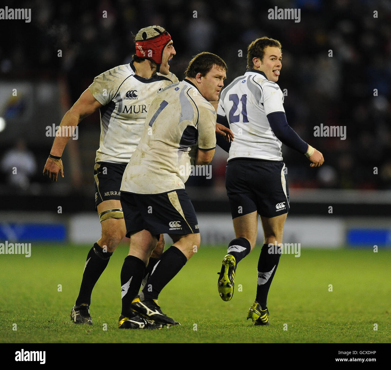 Scotland's Ruaridh Jackson (right) celebrates scoring the winning ...