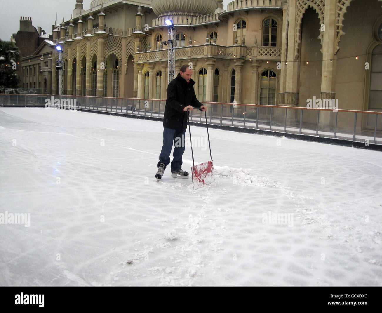 The Royal Pavillion ice rink in Brighton as workers clear the snow in ...