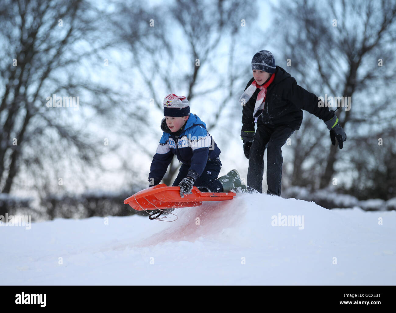 Rob Gilmour jumps his sledge over a snow ramp in Bannockburn, Stirling ...