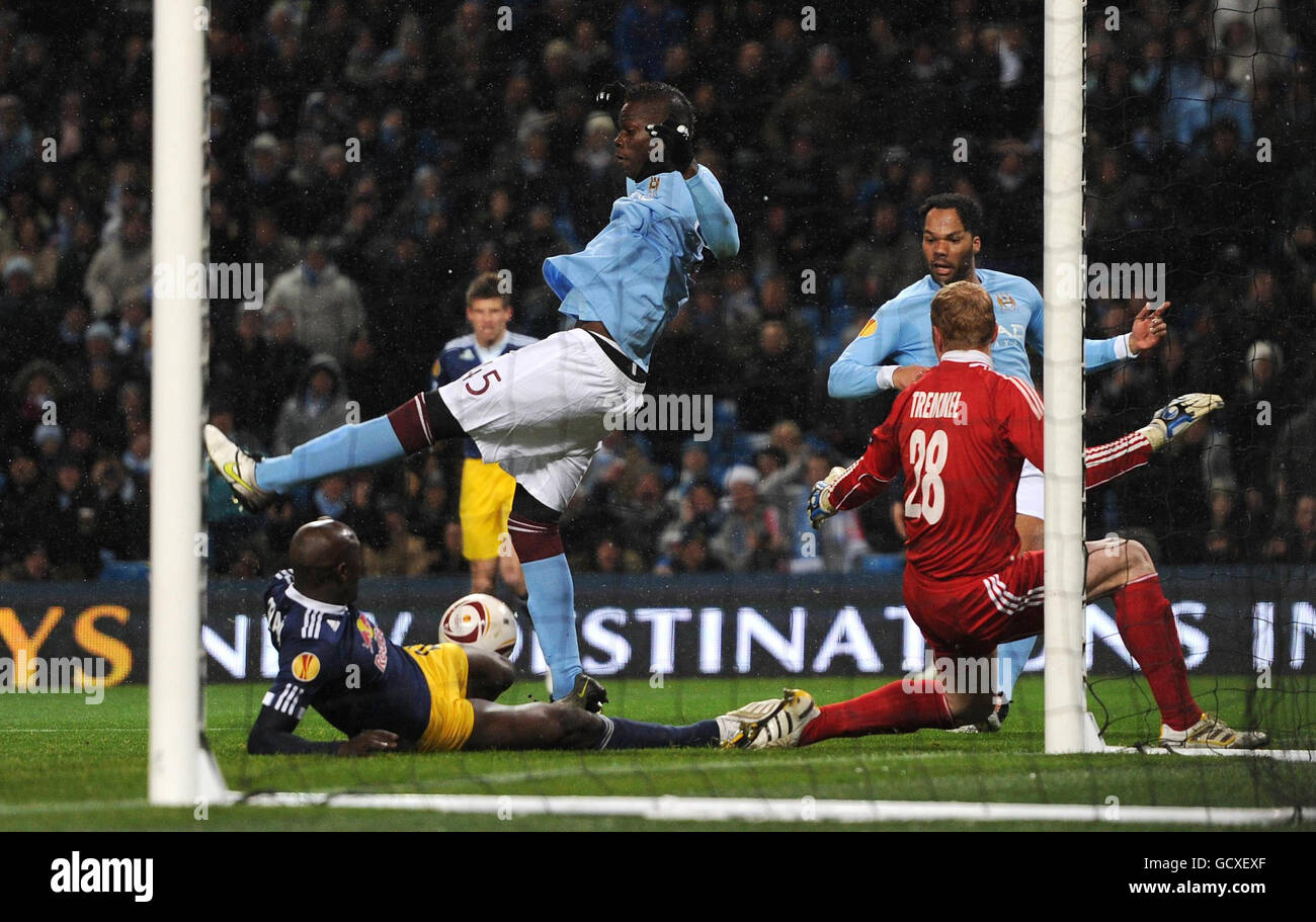 Manchester City's Mario Balotelli has a shot cleared off the line ...