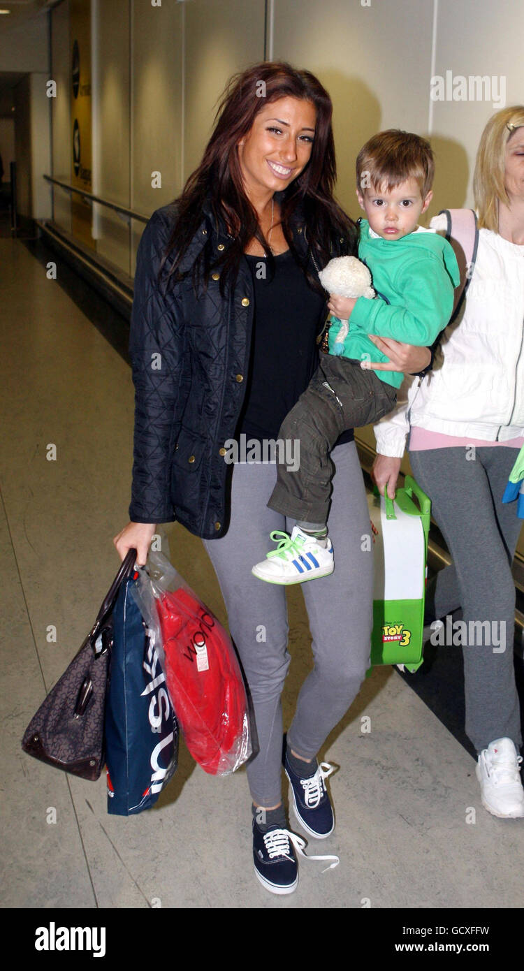 Stacey Solomon with her son Zachary as she arrives at Heathrow Airport ...