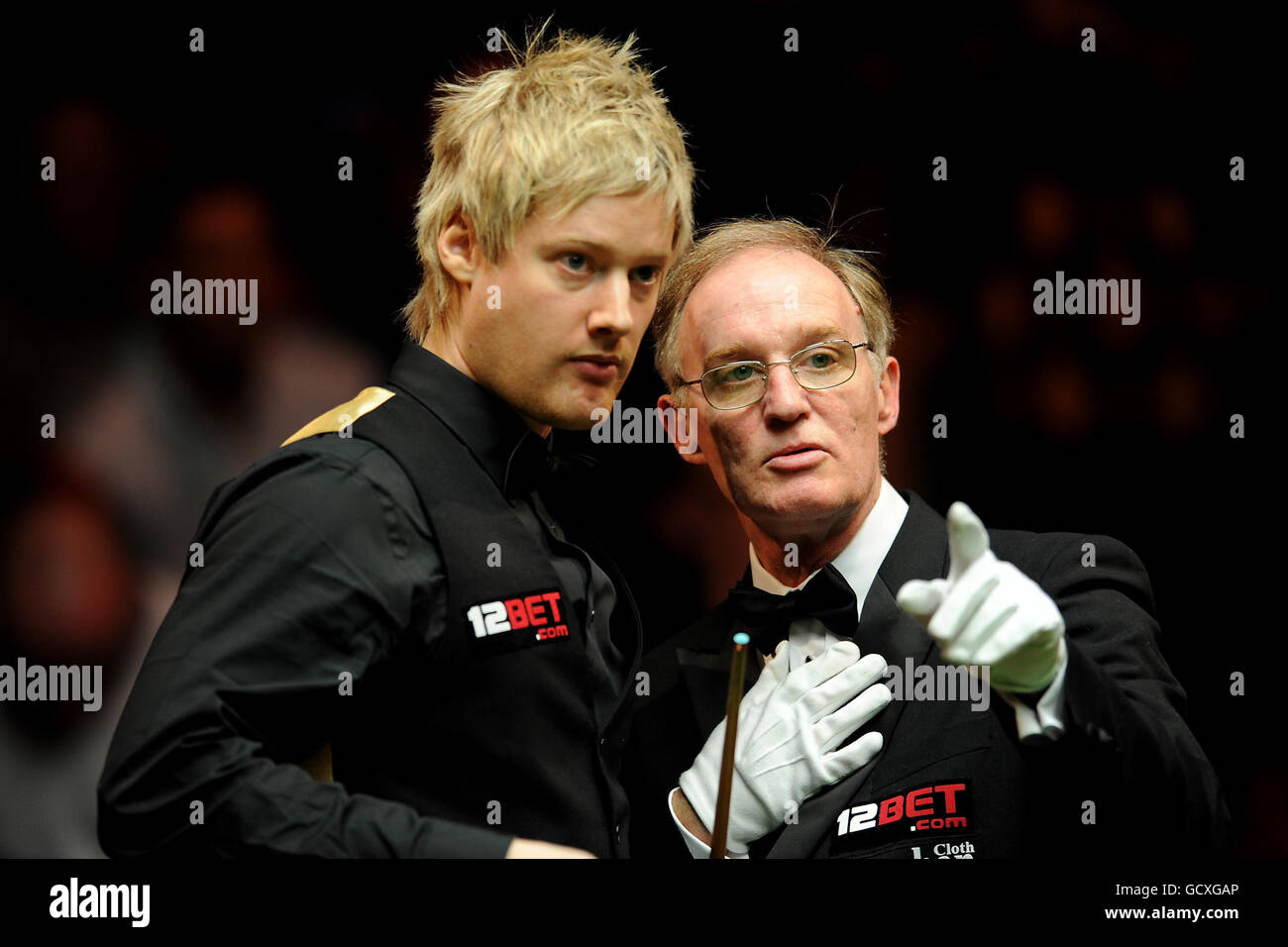 Australia's Neil Robertson (left) chats with referee Leo Scullion after ...