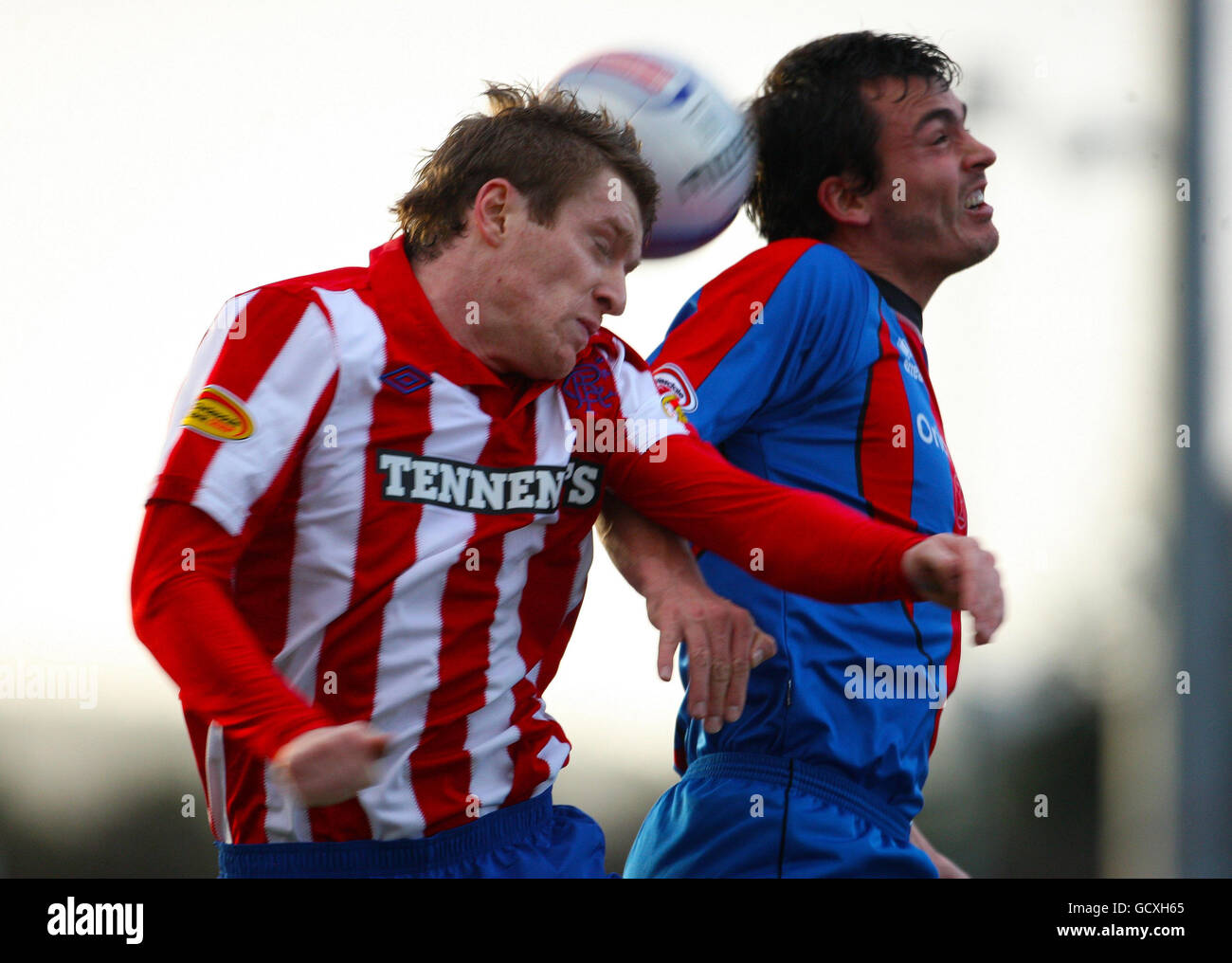 Rangers' Steven Davis and Inverness's Russell Duncan (right) battle for ...