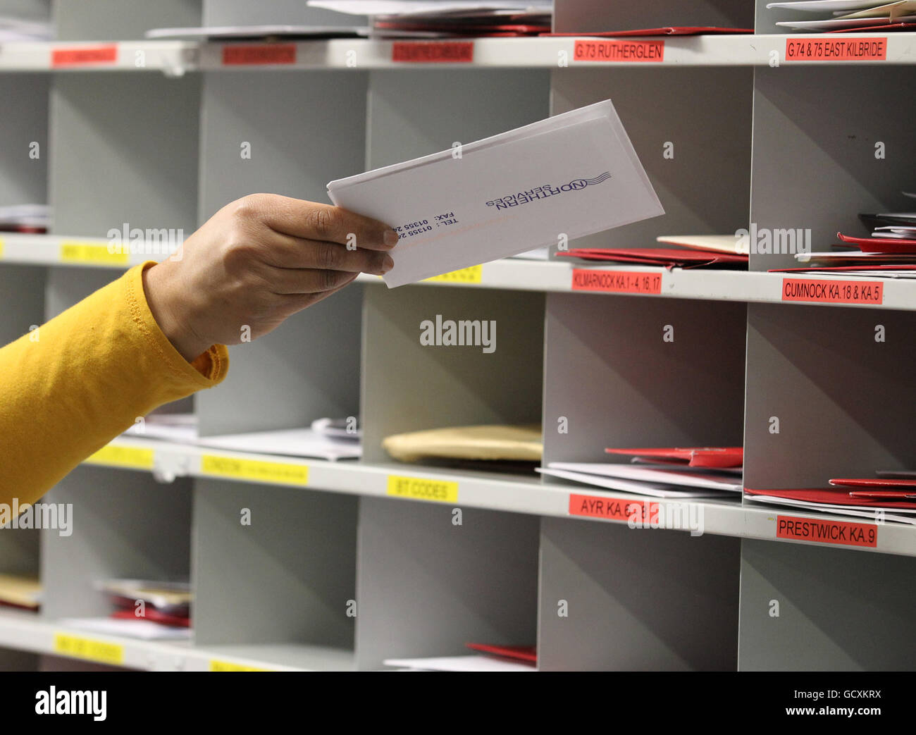 Royal Mail staff at the St Rollox sorting office in Glasgow as they ...