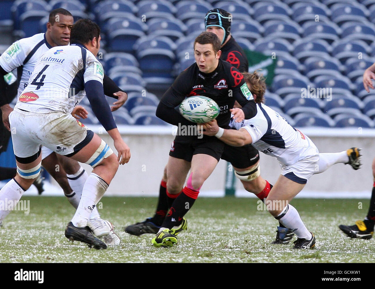 Edinburgh's Greig Laidlaw (centre) breaks through the Castres Olympique ...