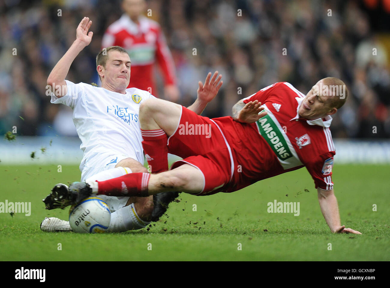 Middlesbrough's Nicky Bailey and Leeds United's Paul Connolly (left ...