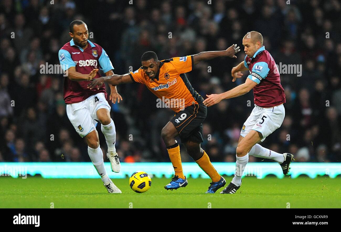West Ham United's Daniel Gabbidon (left) and James Tomkins (right ...