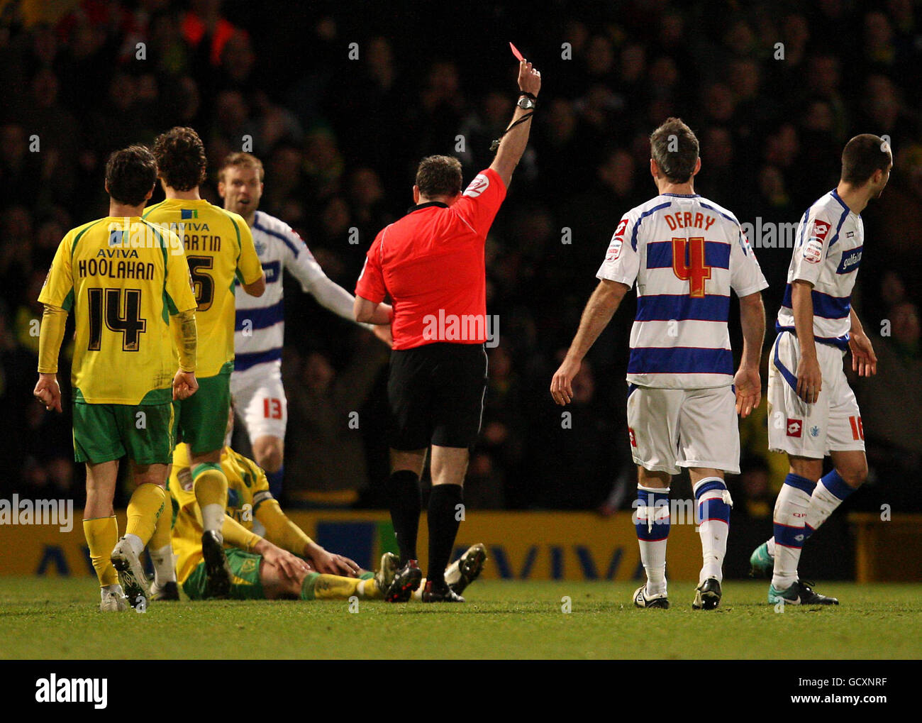 Queens Park Rangers' Matt Connolly (right) is shown the red card during ...