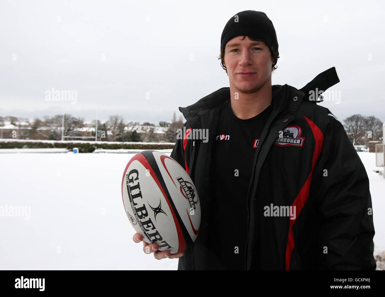 Edinburgh Rugby's David Bishop poses in front of lying snow following ...