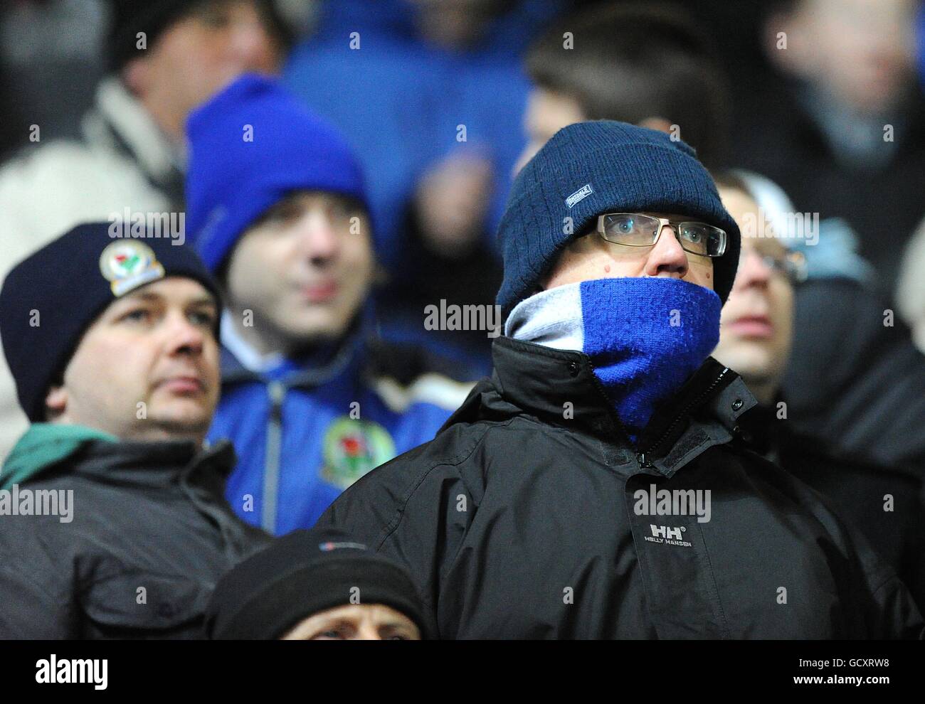 Blackburn rovers fans keep warm in the stands hi-res stock photography ...
