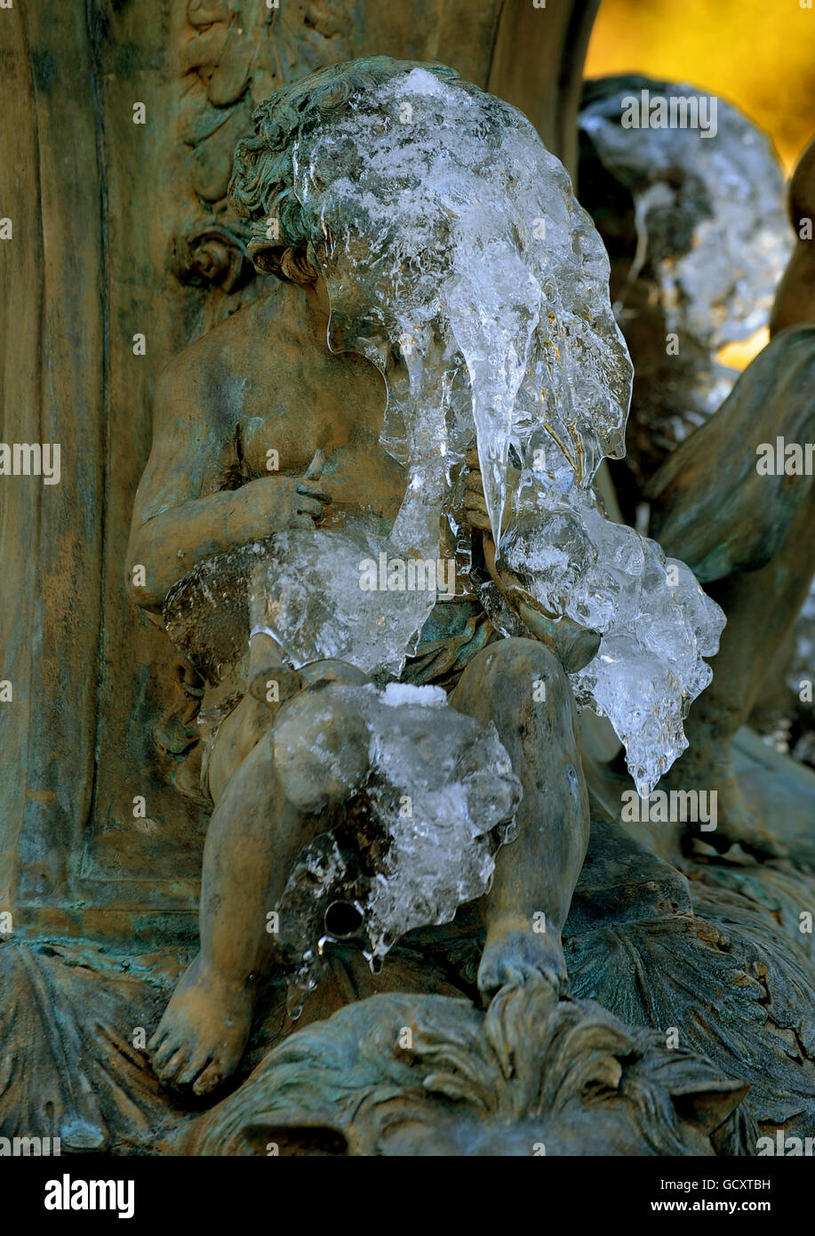 Fountain statues covered in ice at colwick hall hi-res stock ...