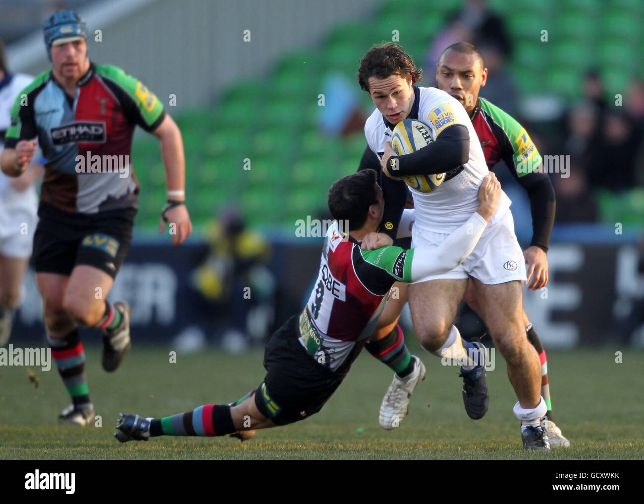Leeds Carnegie's Scott Mathie (right) is tackled by Harlequins' Karl ...
