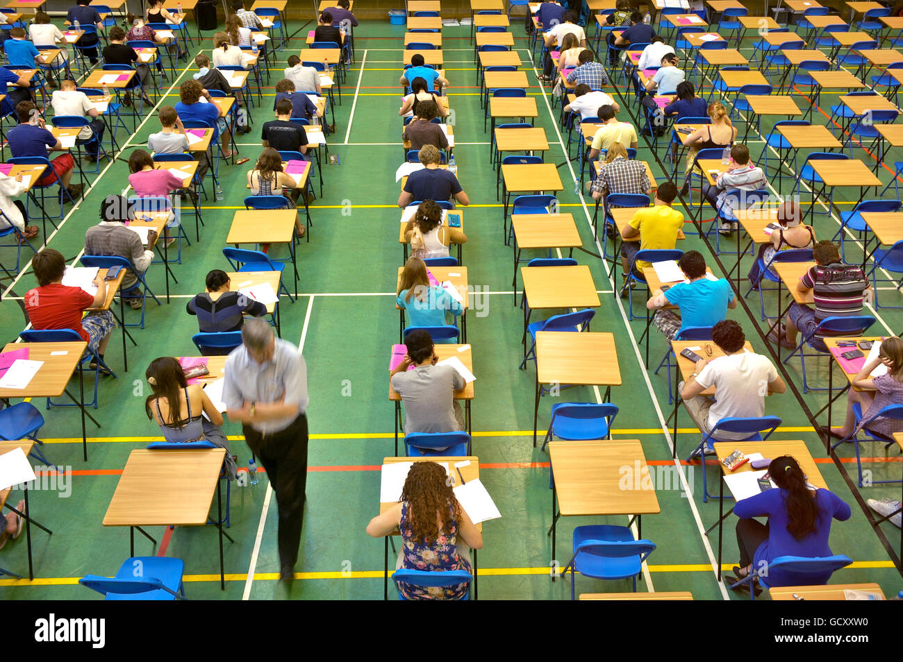 A level students sit an a level maths exam inside sports hall hi-res ...