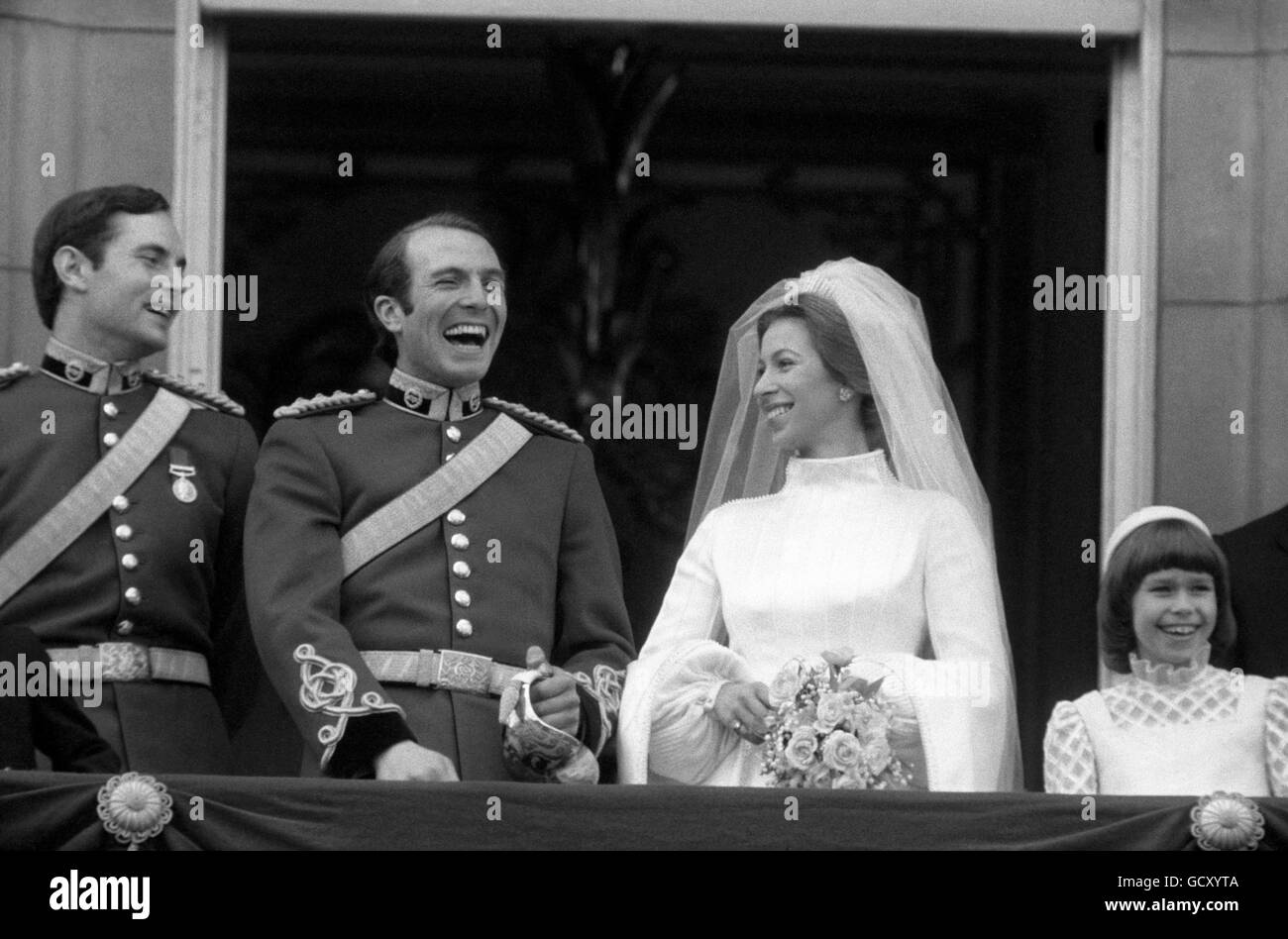 Capitan Mark Phillips and his bride, Princess Anne, acknowledge the ...