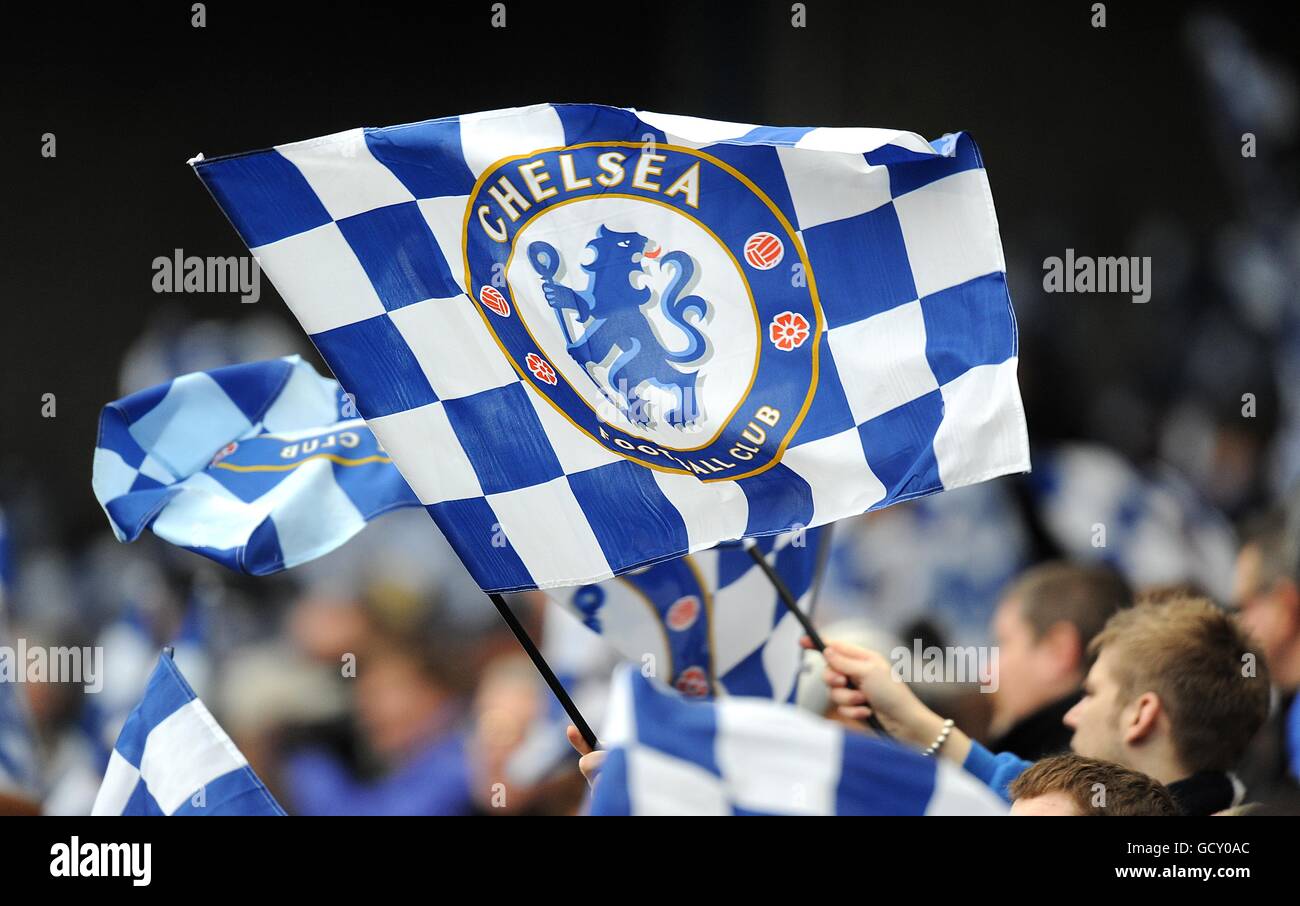Chelsea fans in the stands wave flags hi-res stock photography and ...