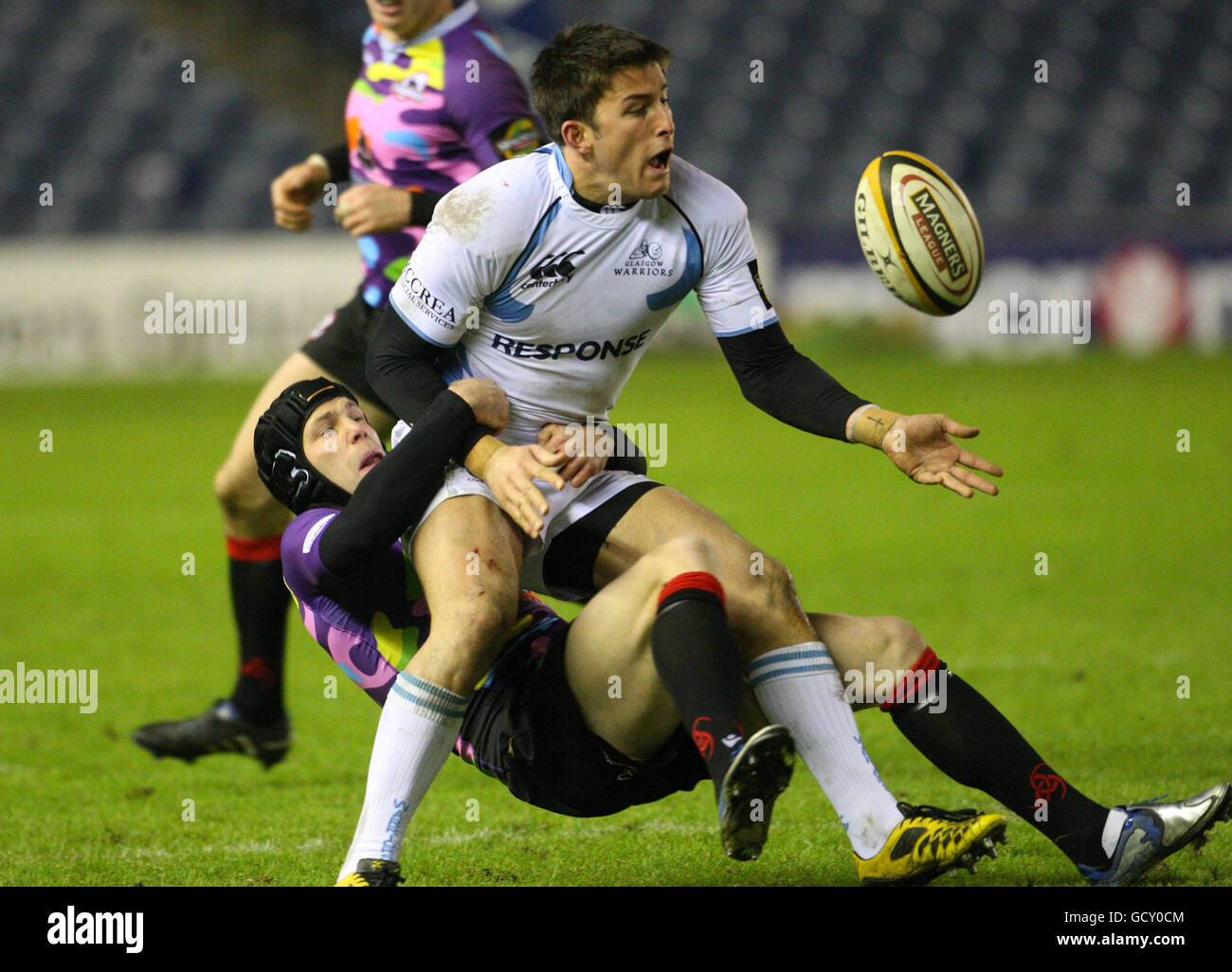 Glasgow's DTH Van Der Merwe (top) and Edinburgh's Simon Webster during ...