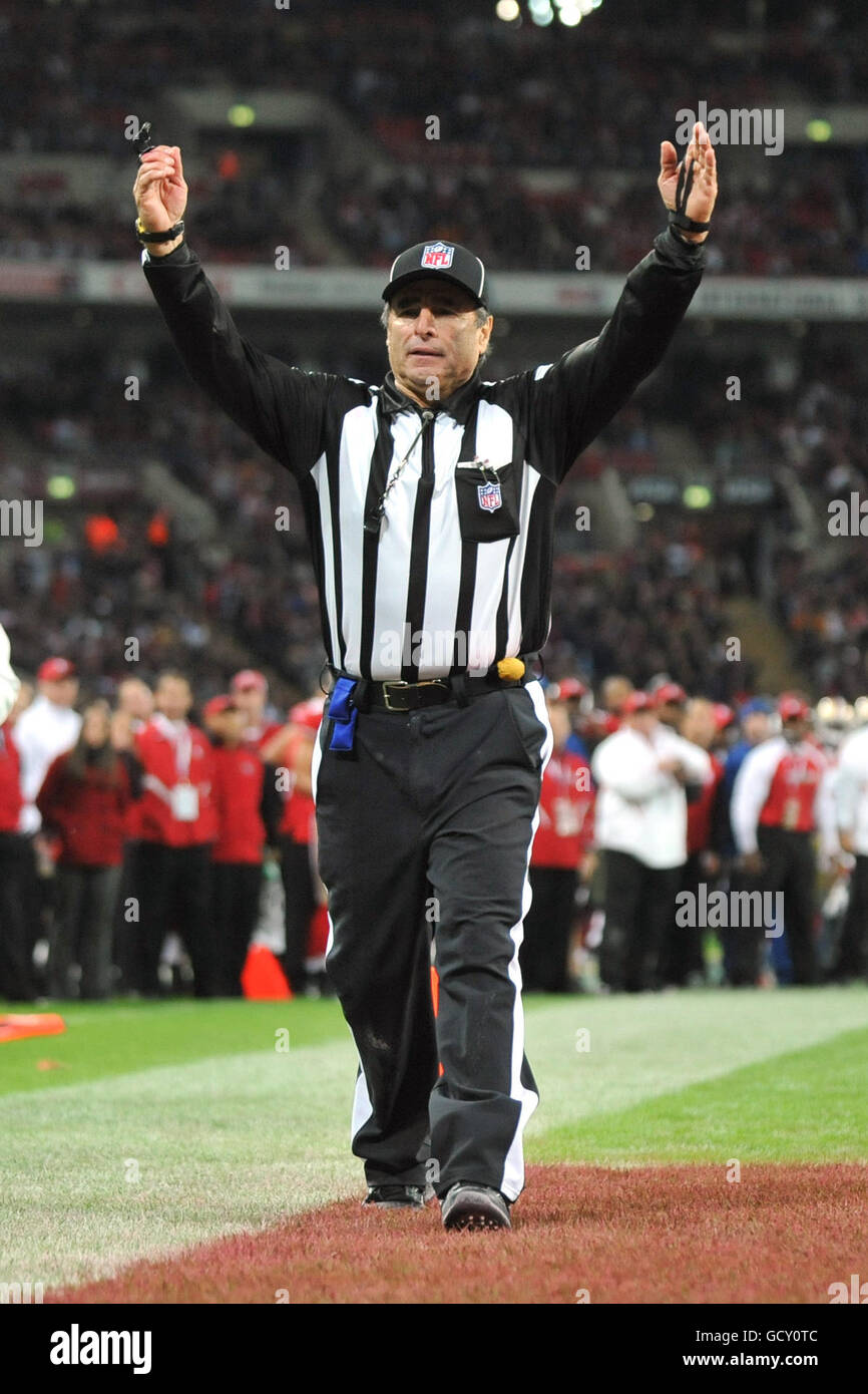 An official signals that a touchdown has been scored hi-res stock ...