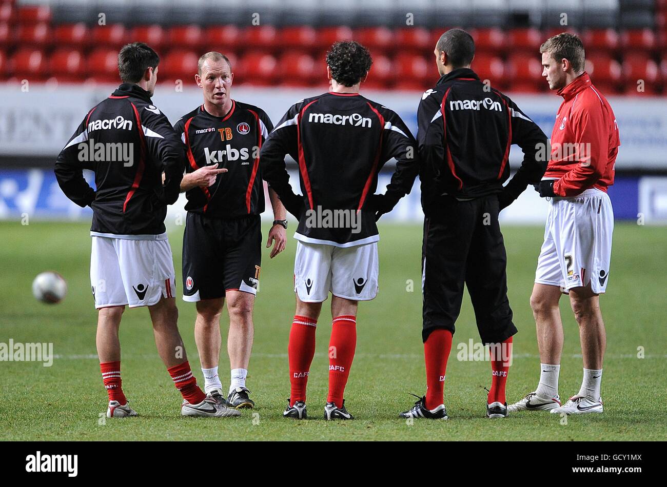 Charlton Athletic assistant manager Tim Breaker (second left) speaks ...