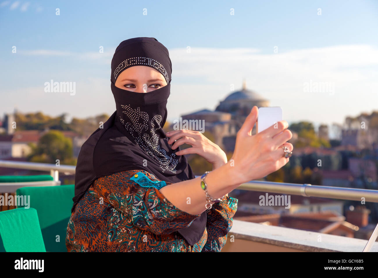 Black lady in hijab hi-res stock photography and images - Alamy
