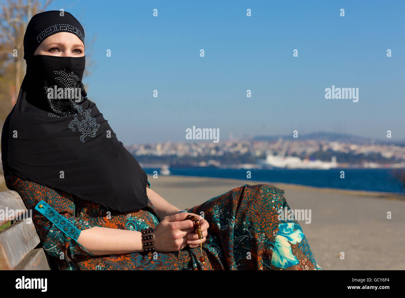 Muslim woman sitting on prayer hi-res stock photography and images - Alamy