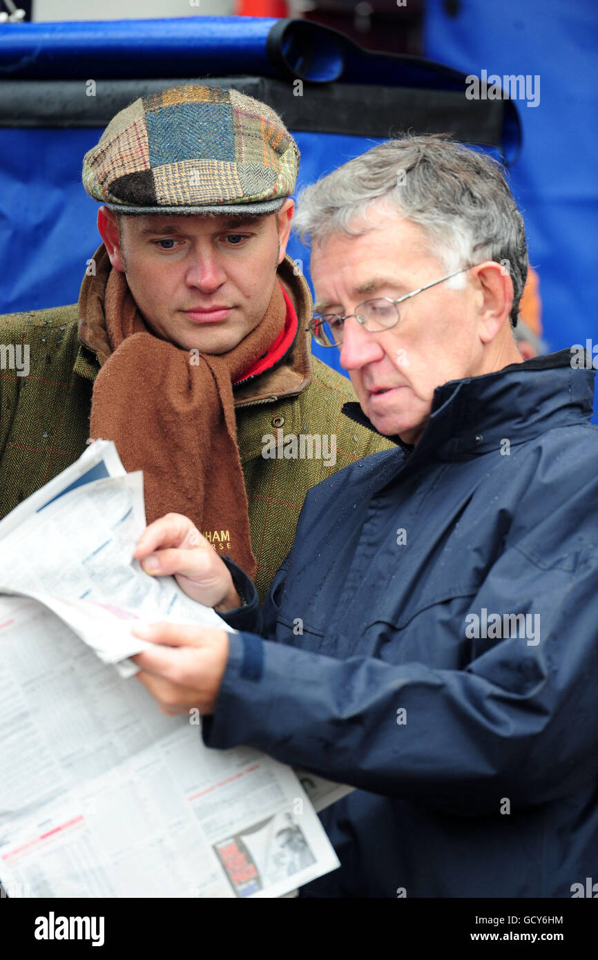 Racegoers read a newspaper hi-res stock photography and images - Alamy