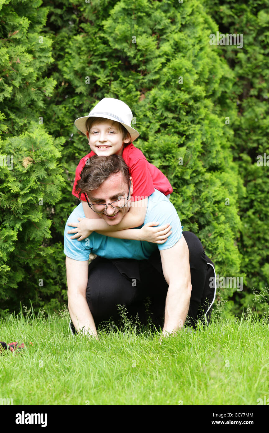 relationship between father and son - family happiness Stock Photo - Alamy