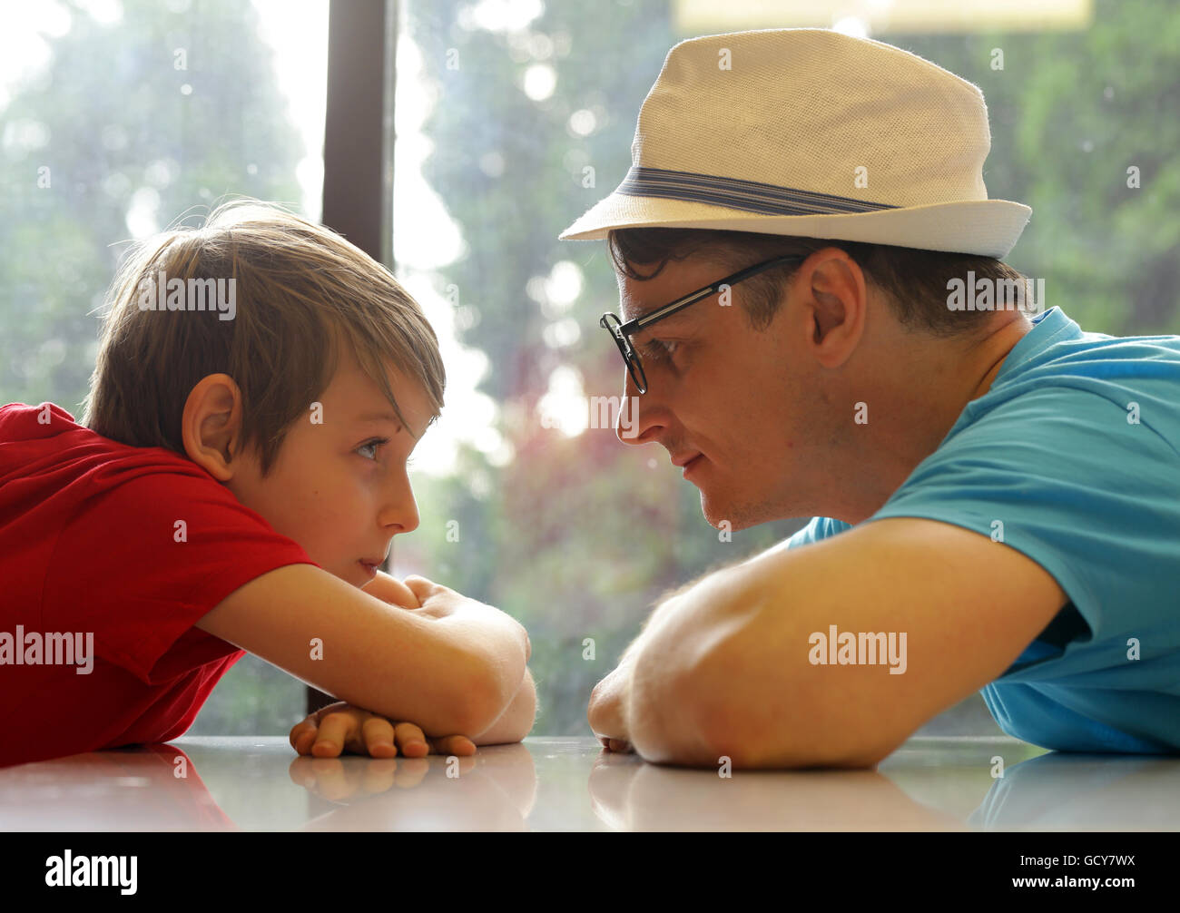 relationship between father and son - family happiness Stock Photo - Alamy