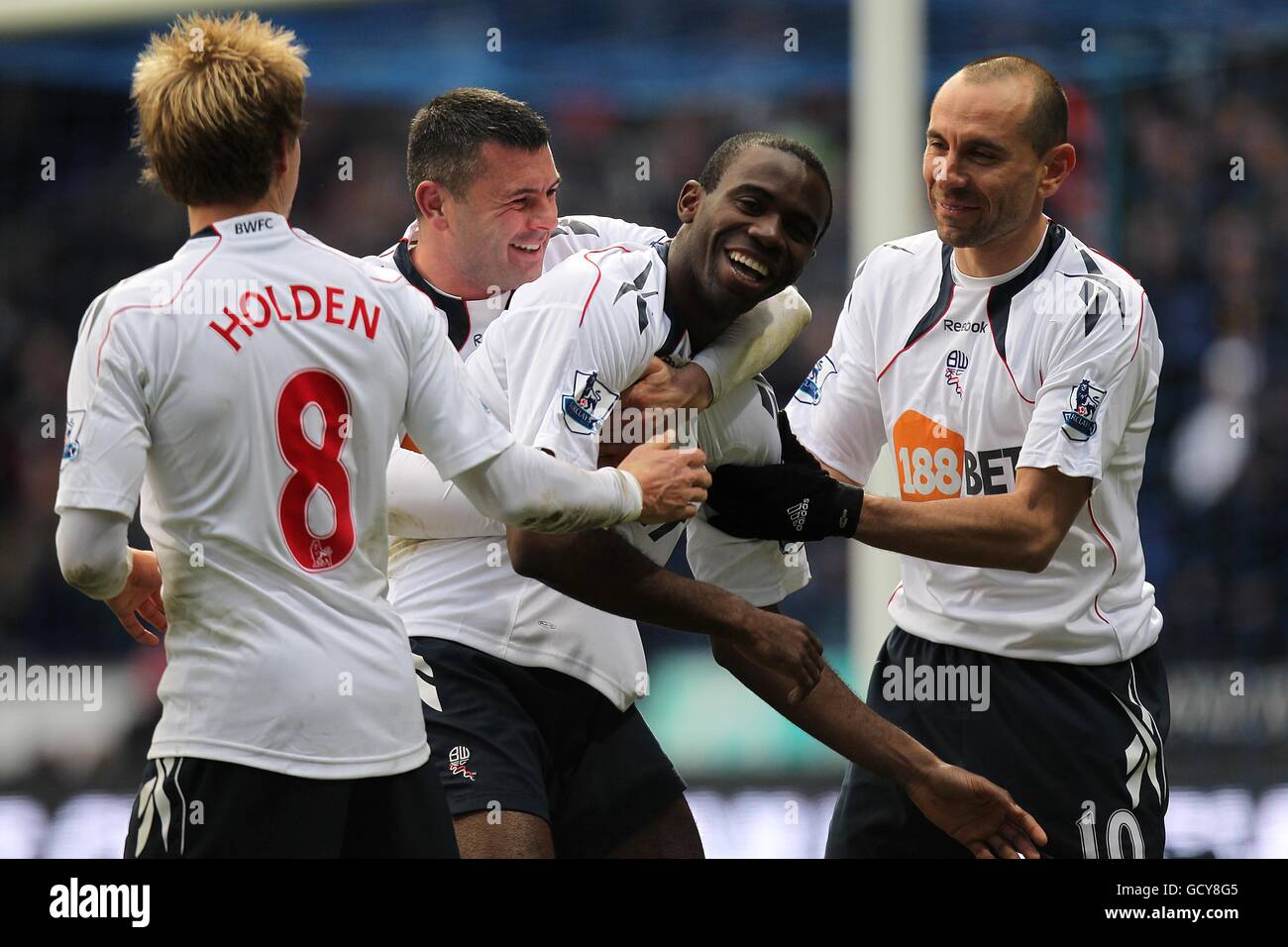 Bolton Wanderers' Fabrice Muamba (second from right) celebrates scoring ...