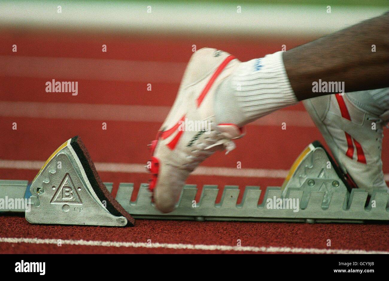 Sprinters foot leaving the blocks hi-res stock photography and images ...
