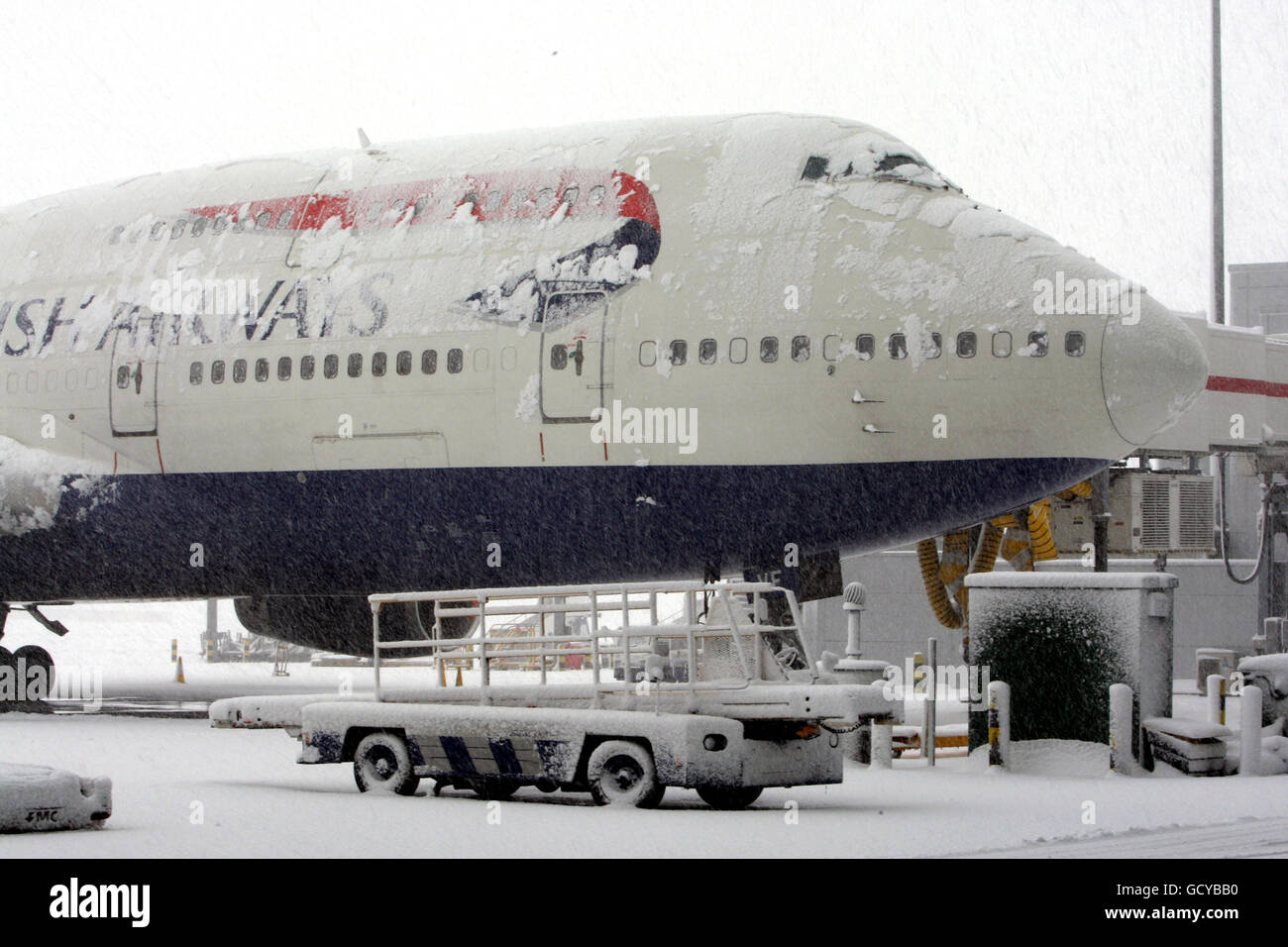A British Airways plane is seen on the tarmac at Heathrow Airport ...