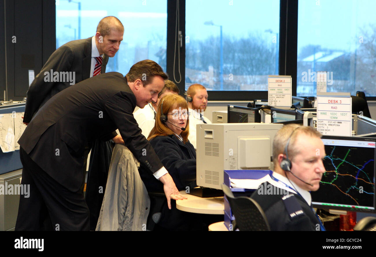 Prime Minister David Cameron, accompanied by Simon Sheldon-Wilson ...